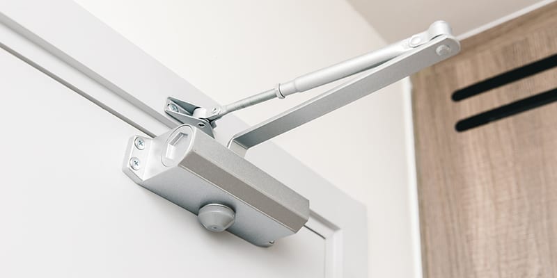 Guide to Door Openers and Closers | Coastal Contract Hardware